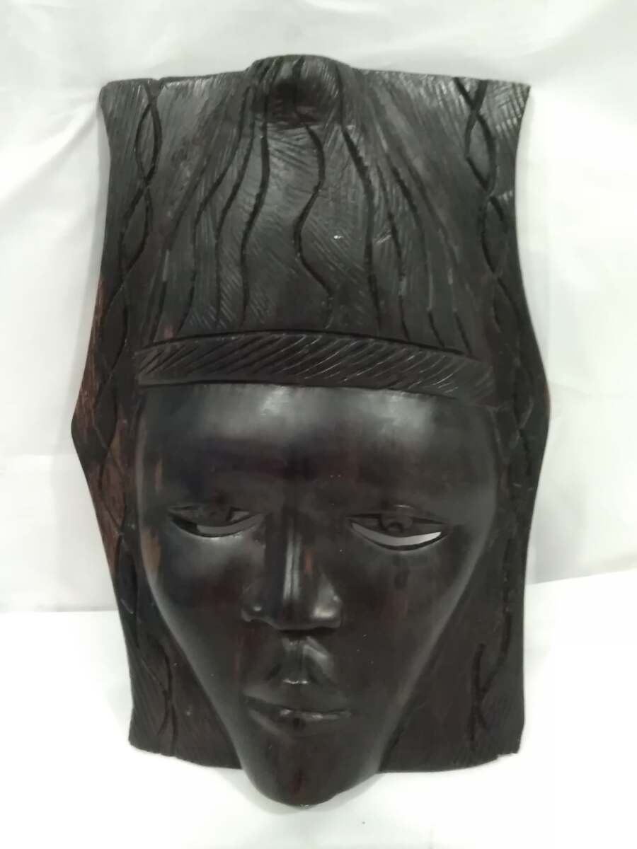 Lot 058 carved African face – Hill's Trading Company Ltd